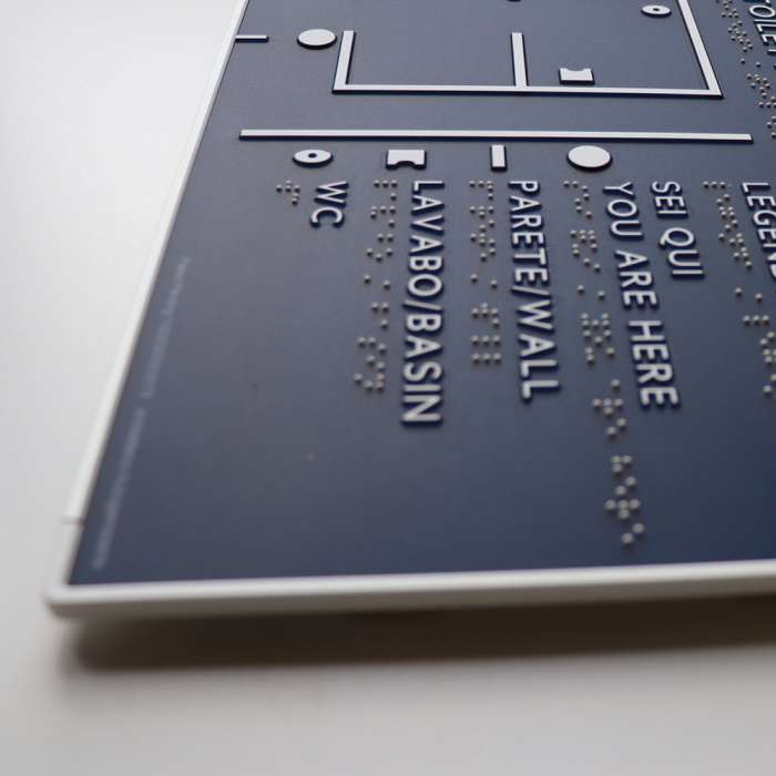 braille signage with raised symbols